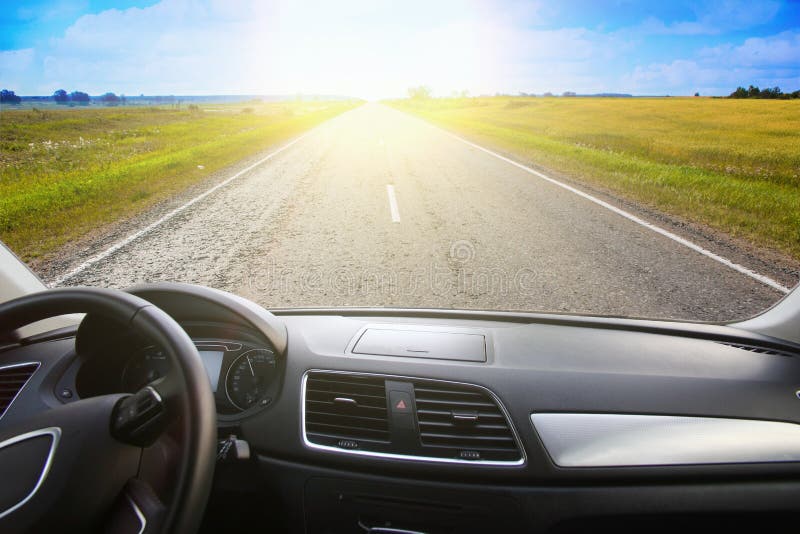 View from the Windshield of a Car Driving Along a Sunset Road Stock ...