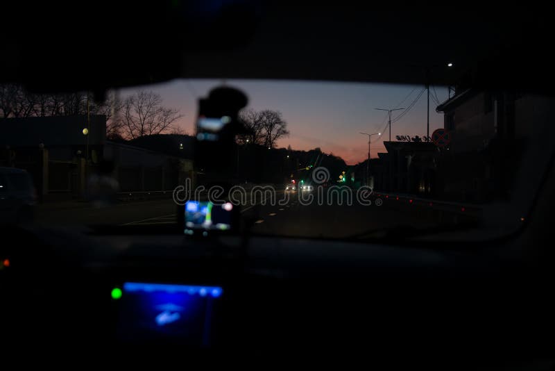 View through the Windshield of the Car on the Road at Night Stock Photo ...