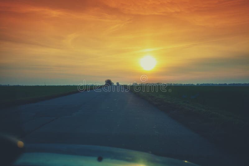 View through the Windshield of a Country Road at Sunset Stock Image ...