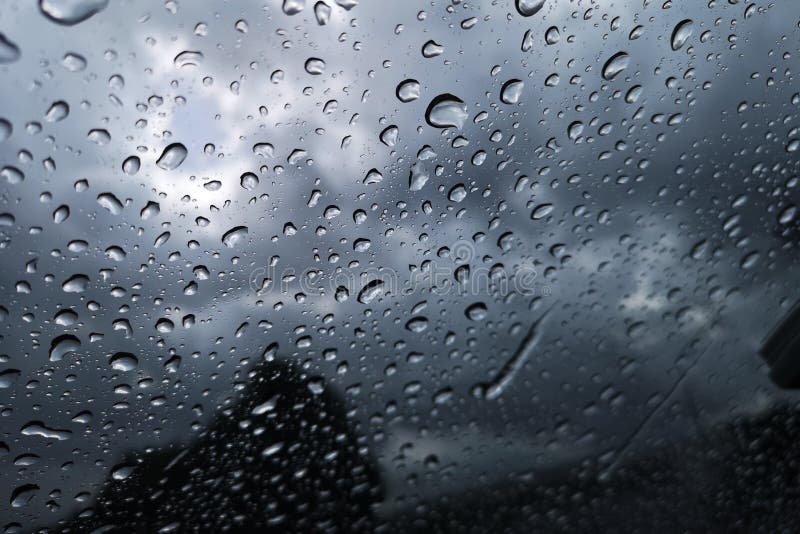 Windshield View on Heavy Rainy Night and a Rear View Mirror with Stock ...