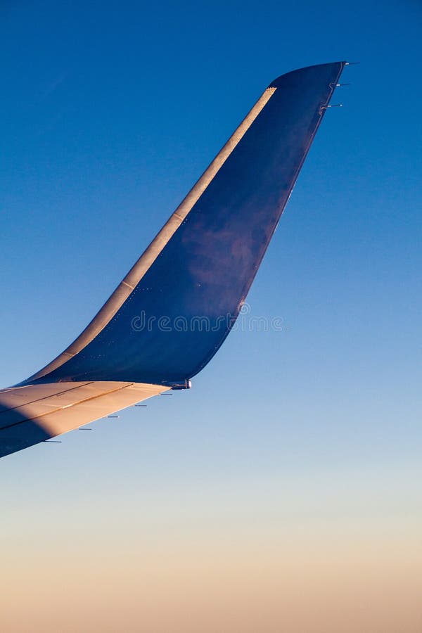 The Wing of Airplan in Front of Sunset Time Flying Stock Image - Image ...