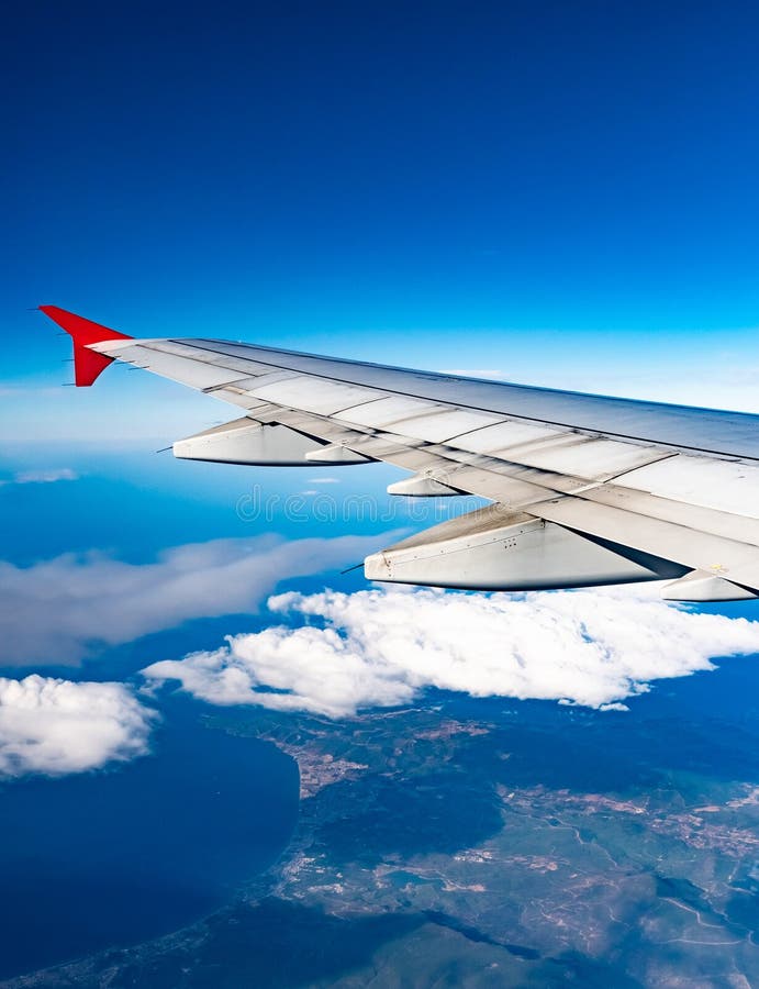 View of the Wing of an Airplane through the Window Stock Image - Image ...