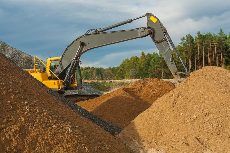 Exkavator Working on Construction Site Near the Road Stock Photo ...