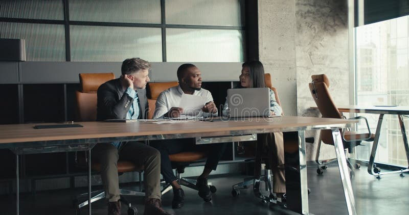 A View of the Work of a Successful Multiracial Trio. Successful Company ...