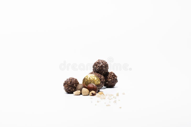 View of Wrapped and Unwrapped Chocolate and Hazelnut Sweets with Raw ...