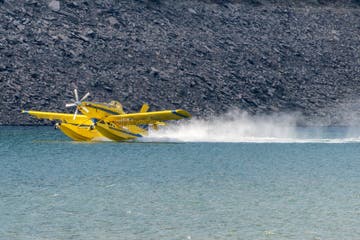 View of Fire Fighting Float Plane Loading Water. Editorial Photo ...