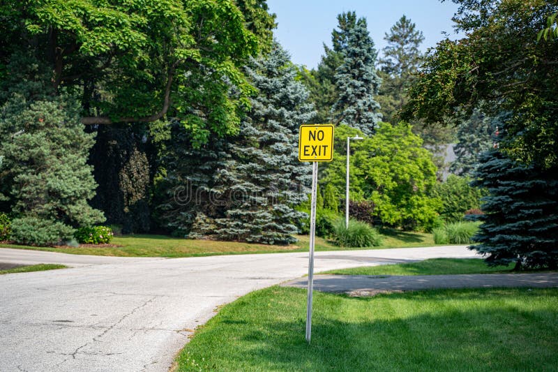 View of Yellow No Exit Sign on Roadside Stock Image - Image of caution ...