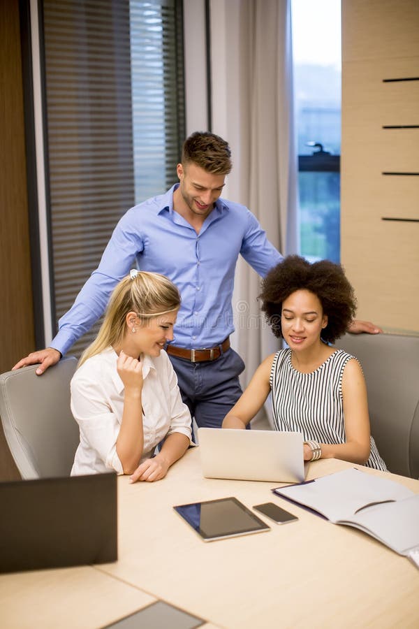 View at Young Business People Working in a Modern Office Stock Image ...