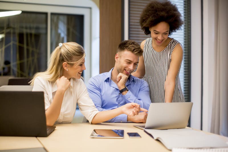 View at Young Business People Working in a Modern Office Stock Photo ...