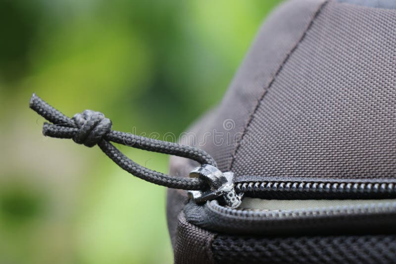 View of a Zipper from a Bag that is Left Open with Natural Green ...