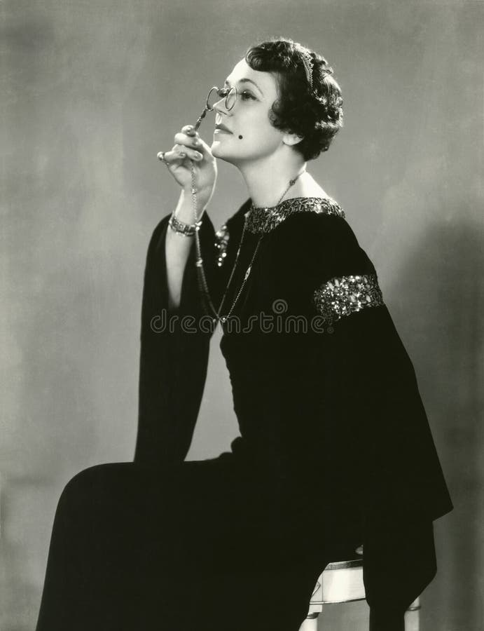 Woman Holding Lorgnette Stock Photos - Free & Royalty-Free Stock Photos ...