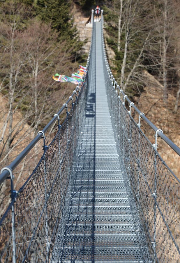 Viewpoint Over a Long Tibetan Bridge Suspended in the Void in Th Stock ...
