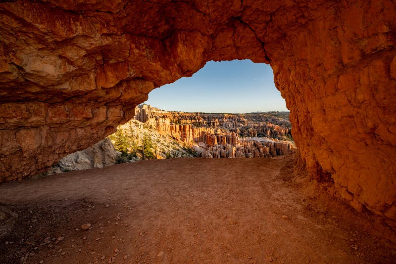 Views of the Amphitheater through Tunnel Below Bryce Point Stock Photo ...