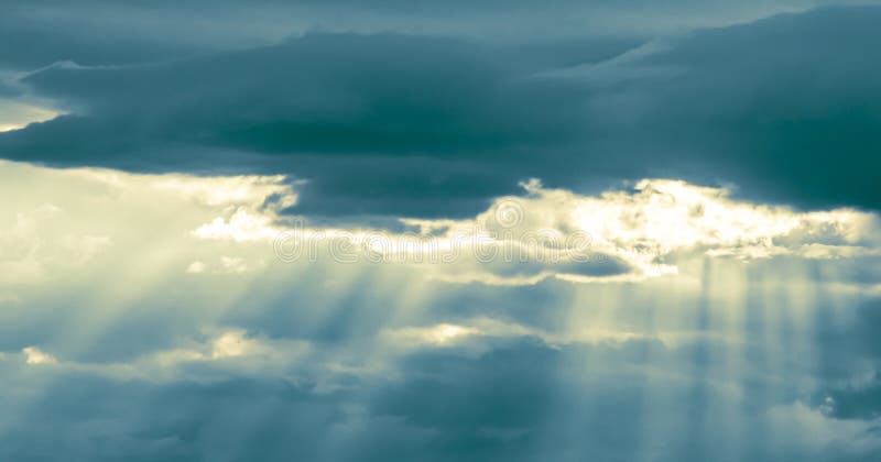 Rays of Sunshine Breaking through a Cloudy Sky in Madrid, Spain. Stock ...