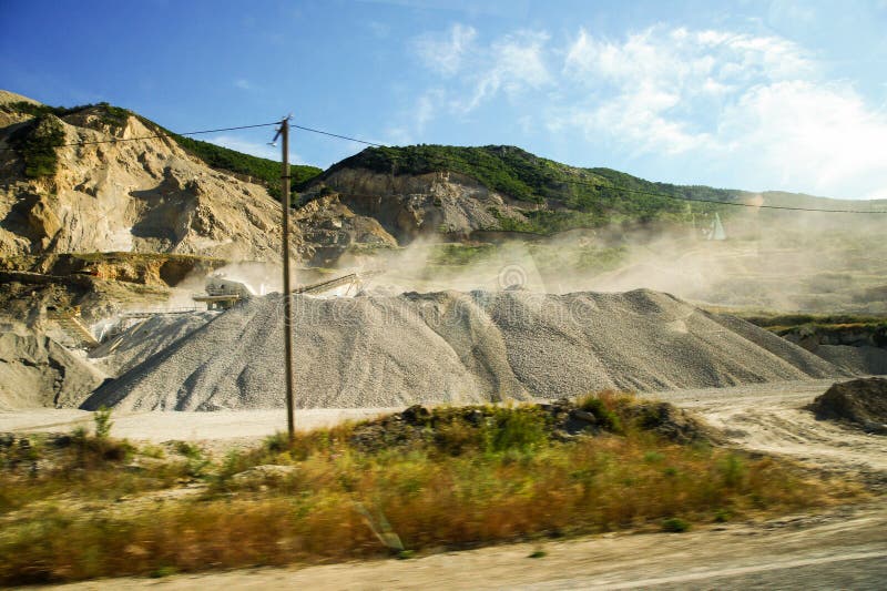 Wind-blown Dust from Crushed Stone Production Stock Photo - Image of ...