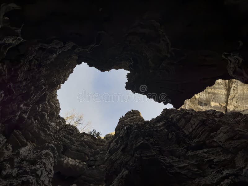 Views from Deep Pits Overlooking the Sky Stock Image - Image of caves ...