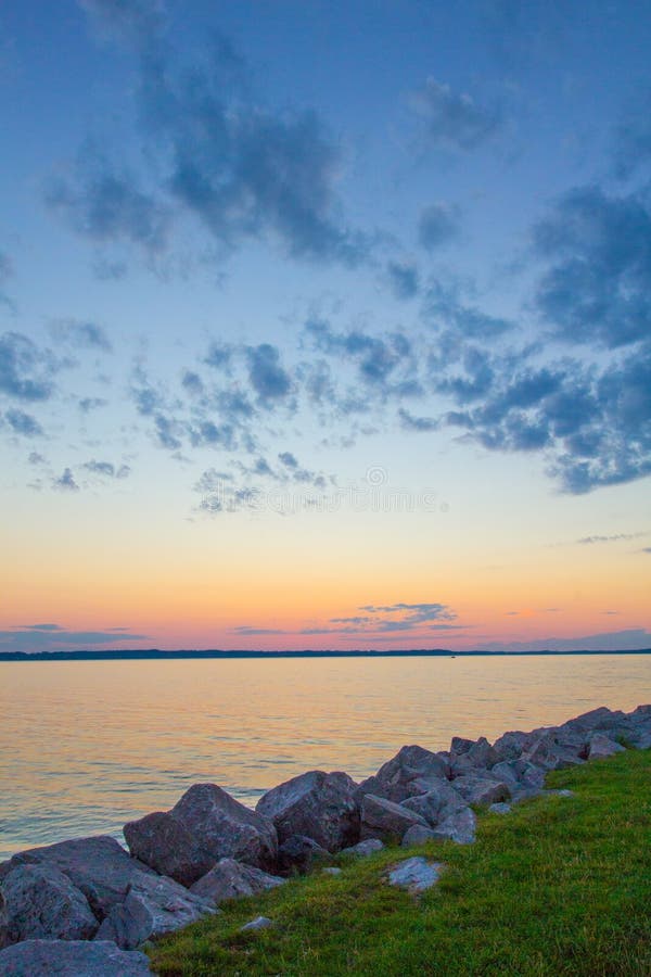 Sunset at Elk Rapids, Michigan Stock Image - Image of rapids, peninsula ...