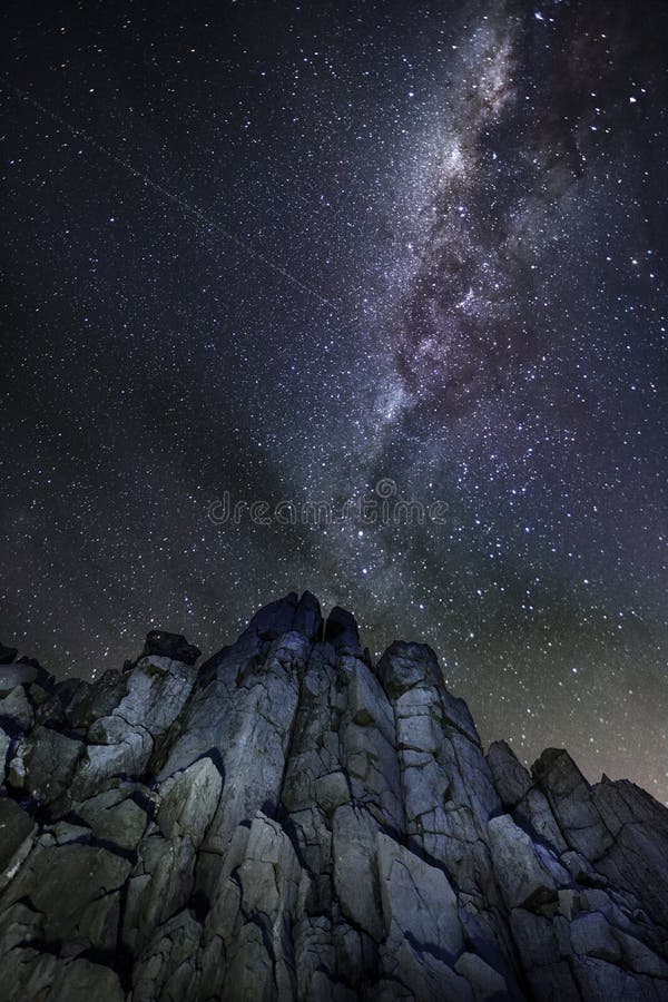 Views of Night Sky from Tall Rocky Cliffs Stock Image - Image of rocks ...