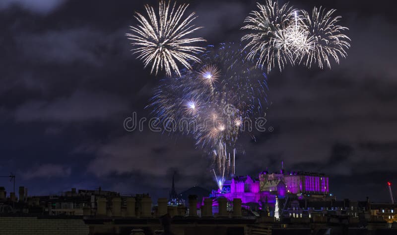 Fireworks Over a Castle from the Rooftops Stock Image - Image of castle ...