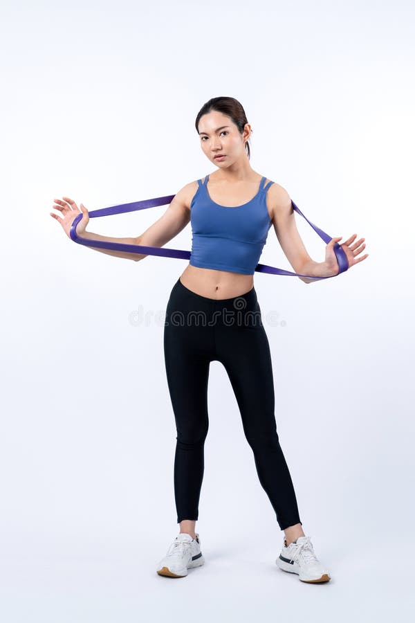 Vigorous Energetic Woman In Sportswear Portrait Stretching Resistance