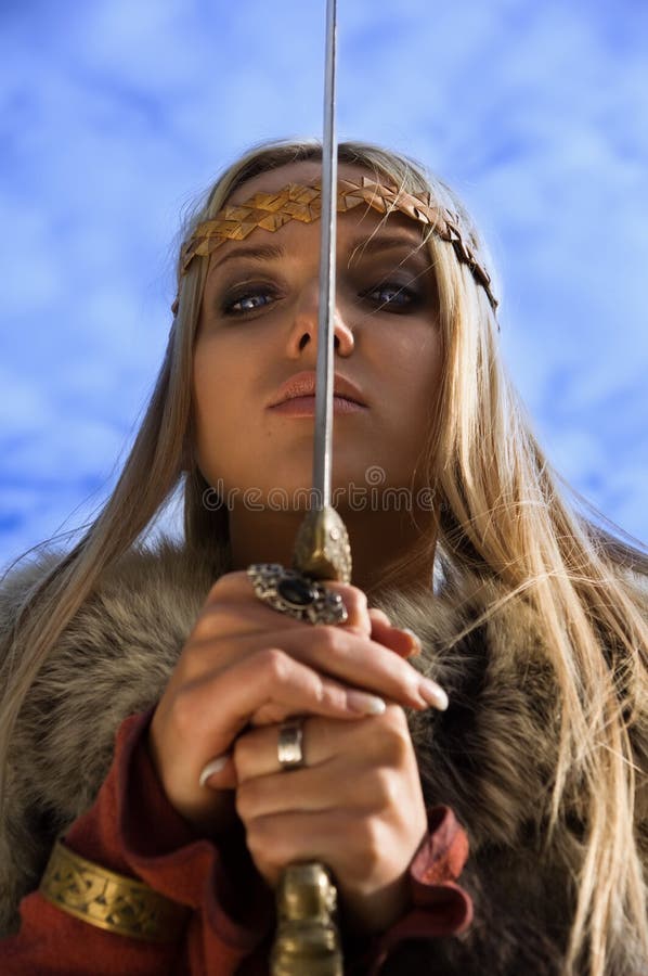 Viking Girl Warrior on a Blue Sky Background Stock Image - Image of ...