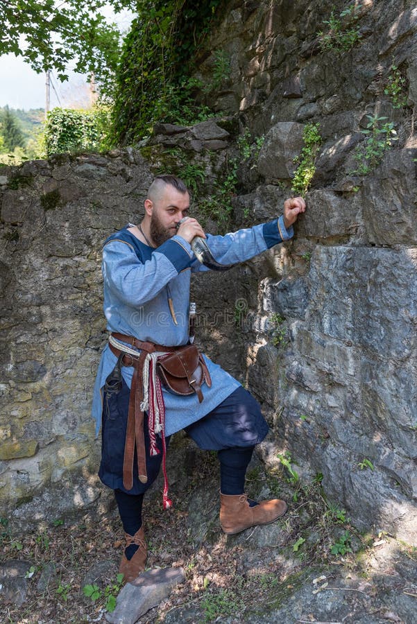 A Viking Warrior Drinks Cider from a Horn Stock Image - Image of ...