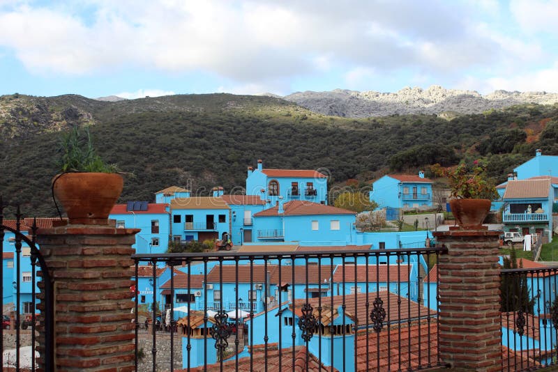 Village with blue houses stock photo. Image of fence - 83720782