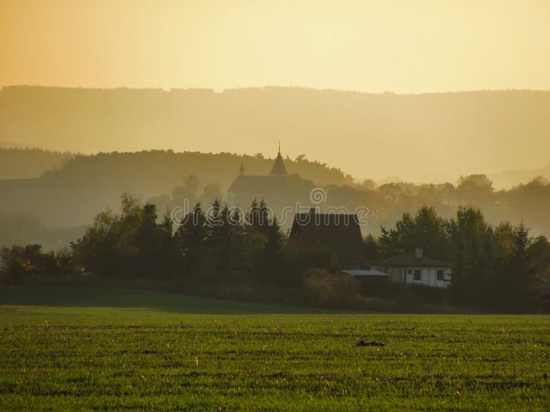 Village in early evening stock image. Image of scene - 16709719