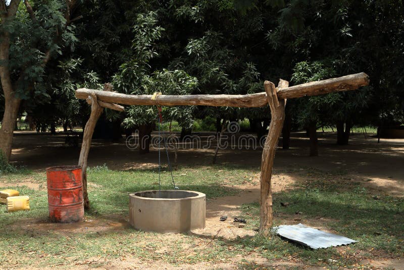 Village fountain in Africa editorial stock image. Image of scarcity ...