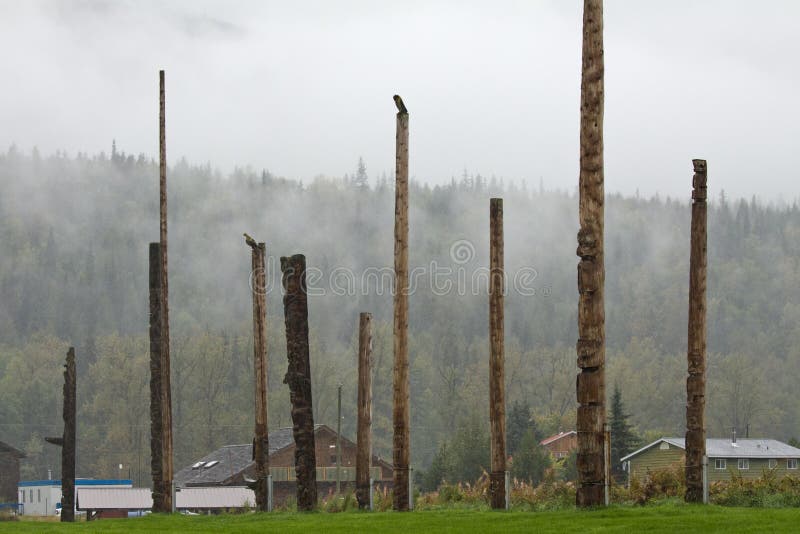 Village of Kispiox, BC with an Array of Traditional Totem Poles Stock ...