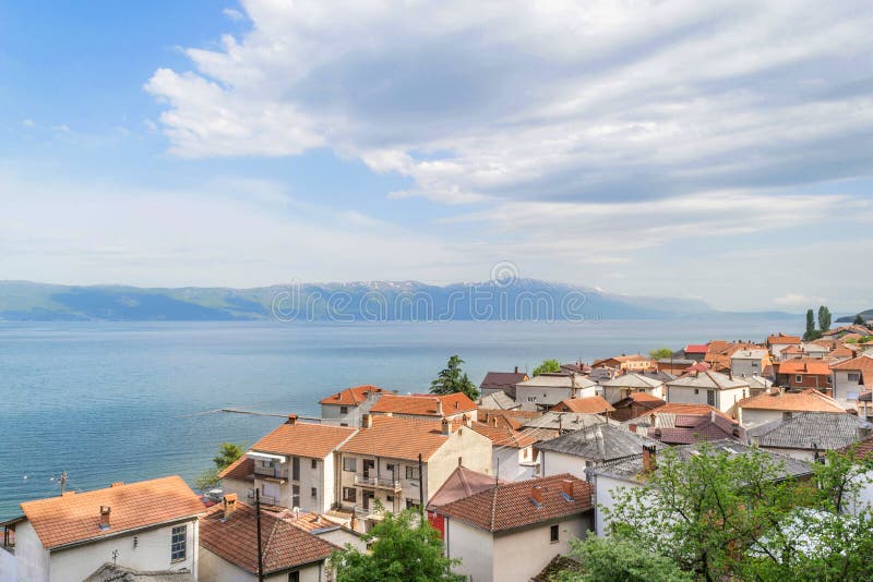 Village by the lake stock photo. Image of architecture - 89952564