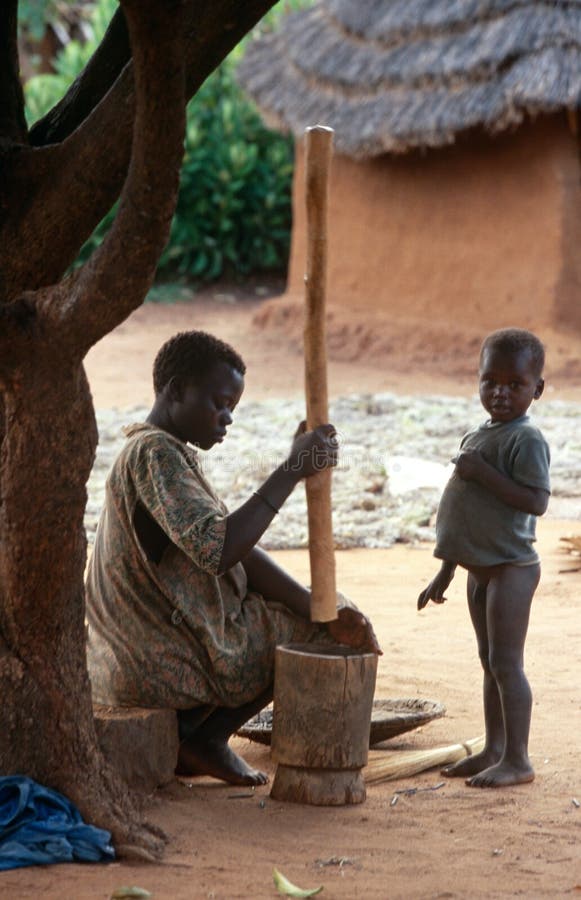 Village life, Uganda. editorial photography. Image of pounding - 25774812