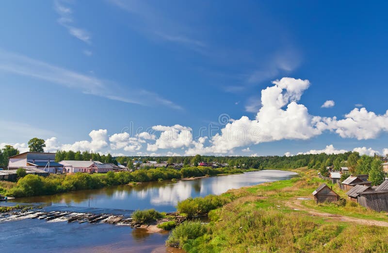 Village with a River Landscape Stock Image - Image of damage, clouds ...