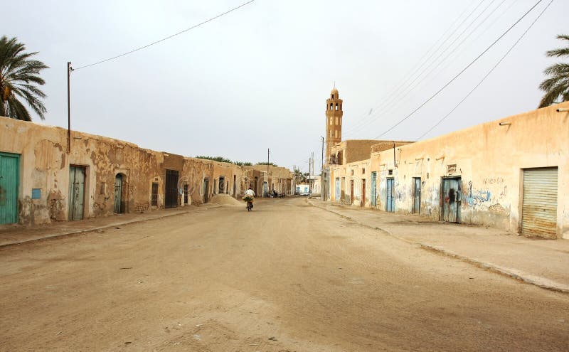Village street in desert editorial image. Image of doors - 17531645