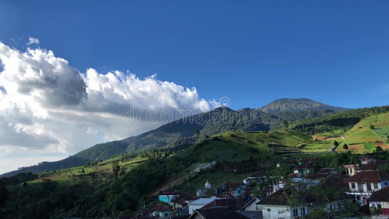 A Village Under the Mountain with Green Forest Stock Footage - Video of ...