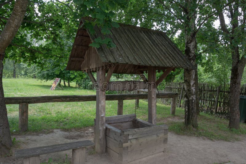 Village Water Well Under a Birch Tree Stock Photo - Image of birch ...