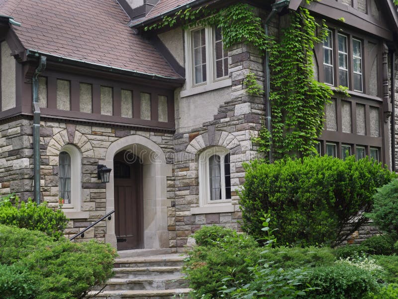 Vine covered house stock photo. Image of door, bush - 118835320