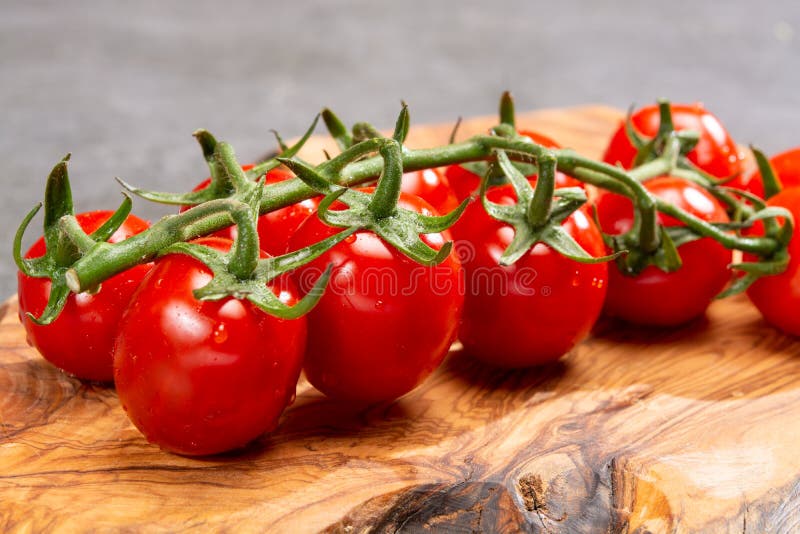 Vine of Fresh Red Ripe Cherry Tomatoes Close Up Stock Photo - Image of ...