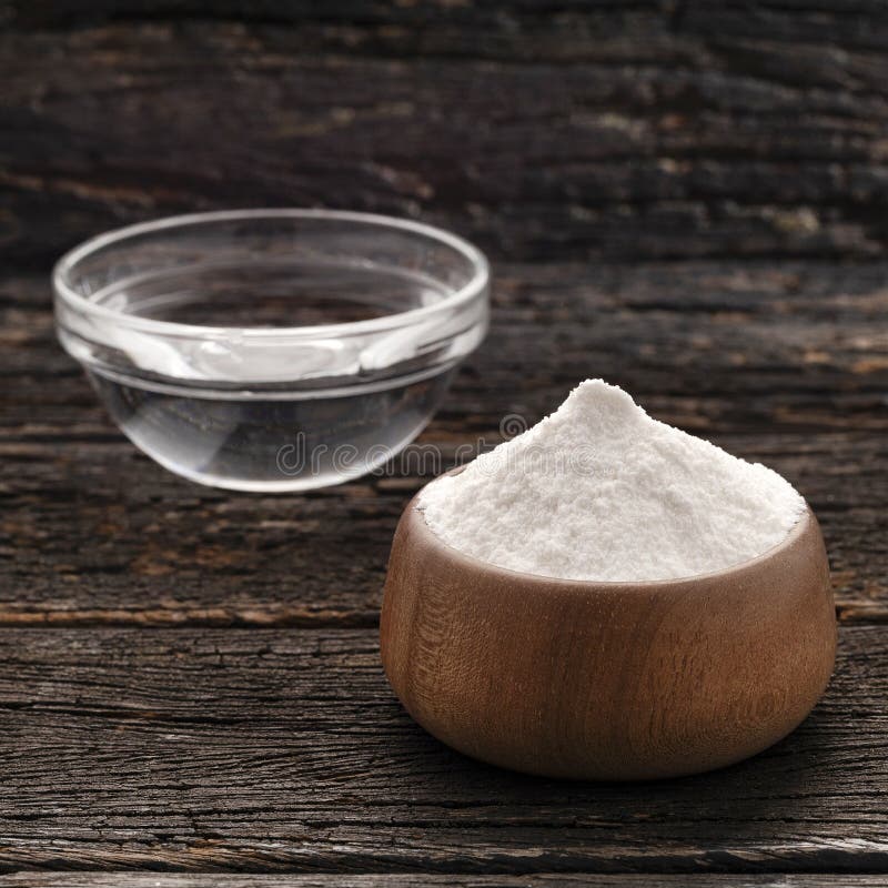 Vinegar and Baking Soda Mix in a Glass Bowl Stock Photo - Image of ...