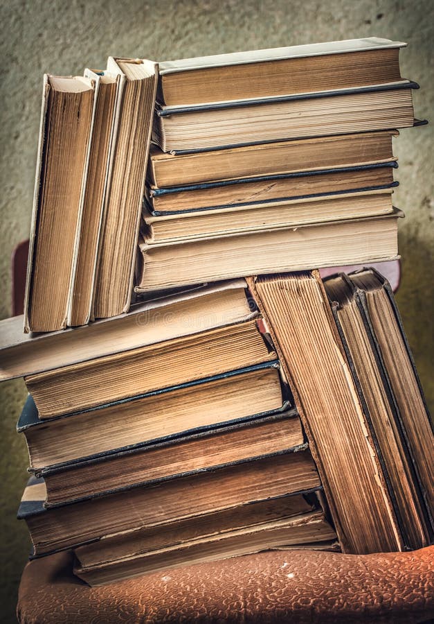 Vintage Background with Old Books. Stack of Books Folded on a Chair ...