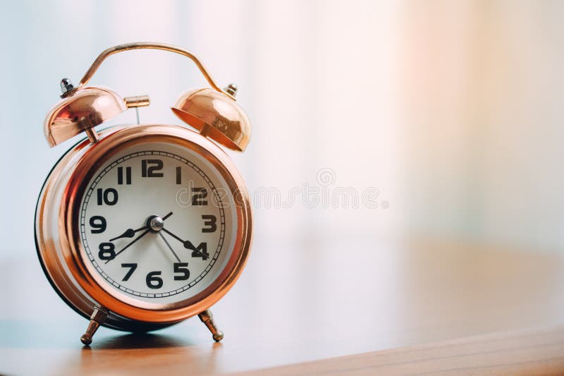 Vintage Bell Alarm Clock on the Table Stock Image - Image of hour ...