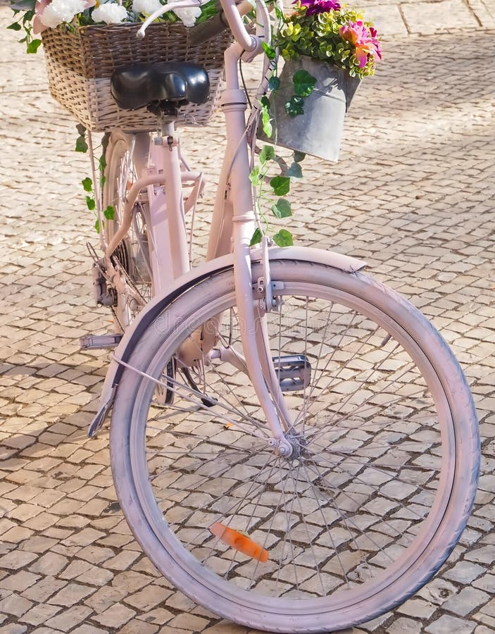 Vintage Bicycle in Cream Color with Flowers in a Basket Stock Image ...
