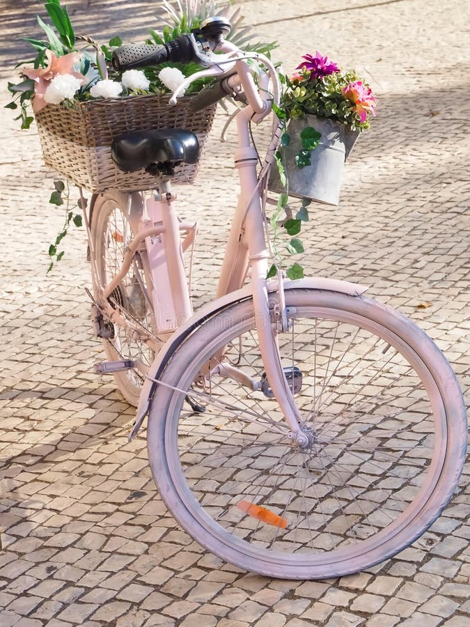Vintage Bicycle in Cream Color with Flowers in a Basket Stock Image ...