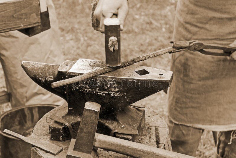 Vintage Blacksmith Tools on Wooden Table Stock Image - Image of hammer ...