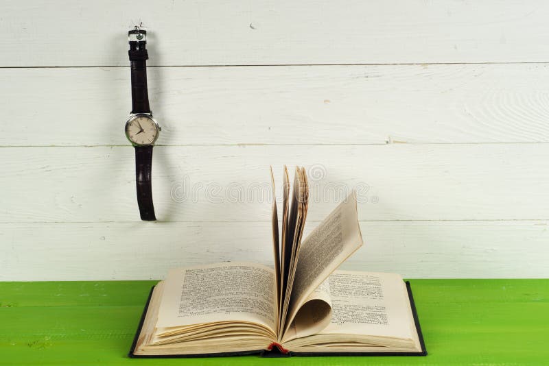 Vintage books and clock stock photo. Image of tabletop - 67559356
