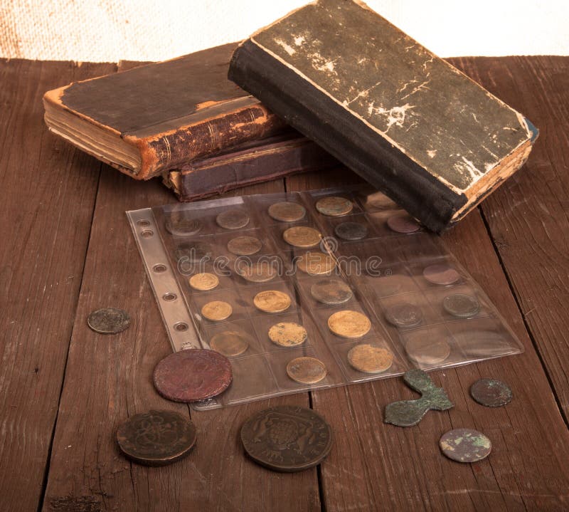 Vintage Books and Coins on Old Wooden Table Stock Photo - Image of ...