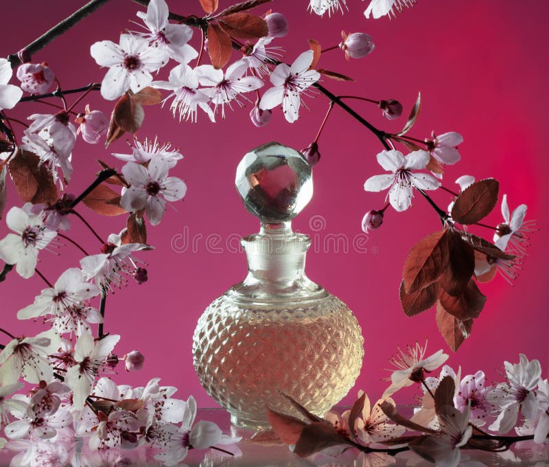 Vintage Bottle of Perfume with Spring Flowers Stock Photo - Image of ...