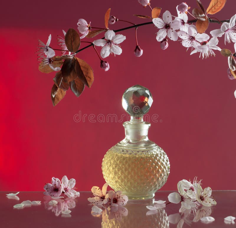 Vintage Bottle of Perfume with Spring Flowers Stock Photo - Image of ...