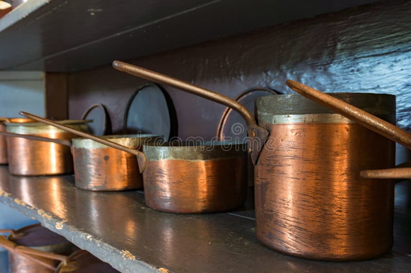 Vintage Brass Cookware, Old Pots on a Shelf. Rustic Kitchenware Stock ...