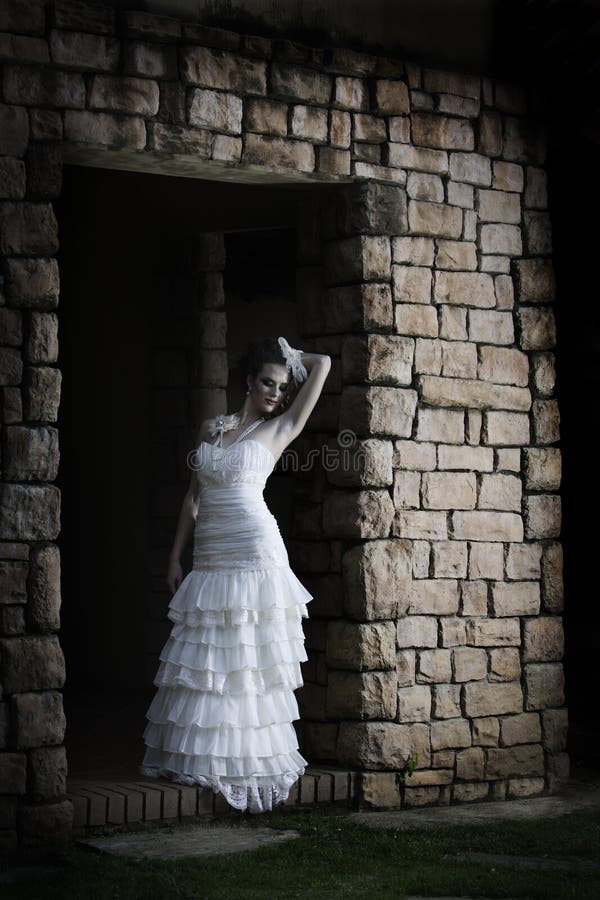 Vintage Bride Leaning Against Brick Wall Stock Image - Image of green ...